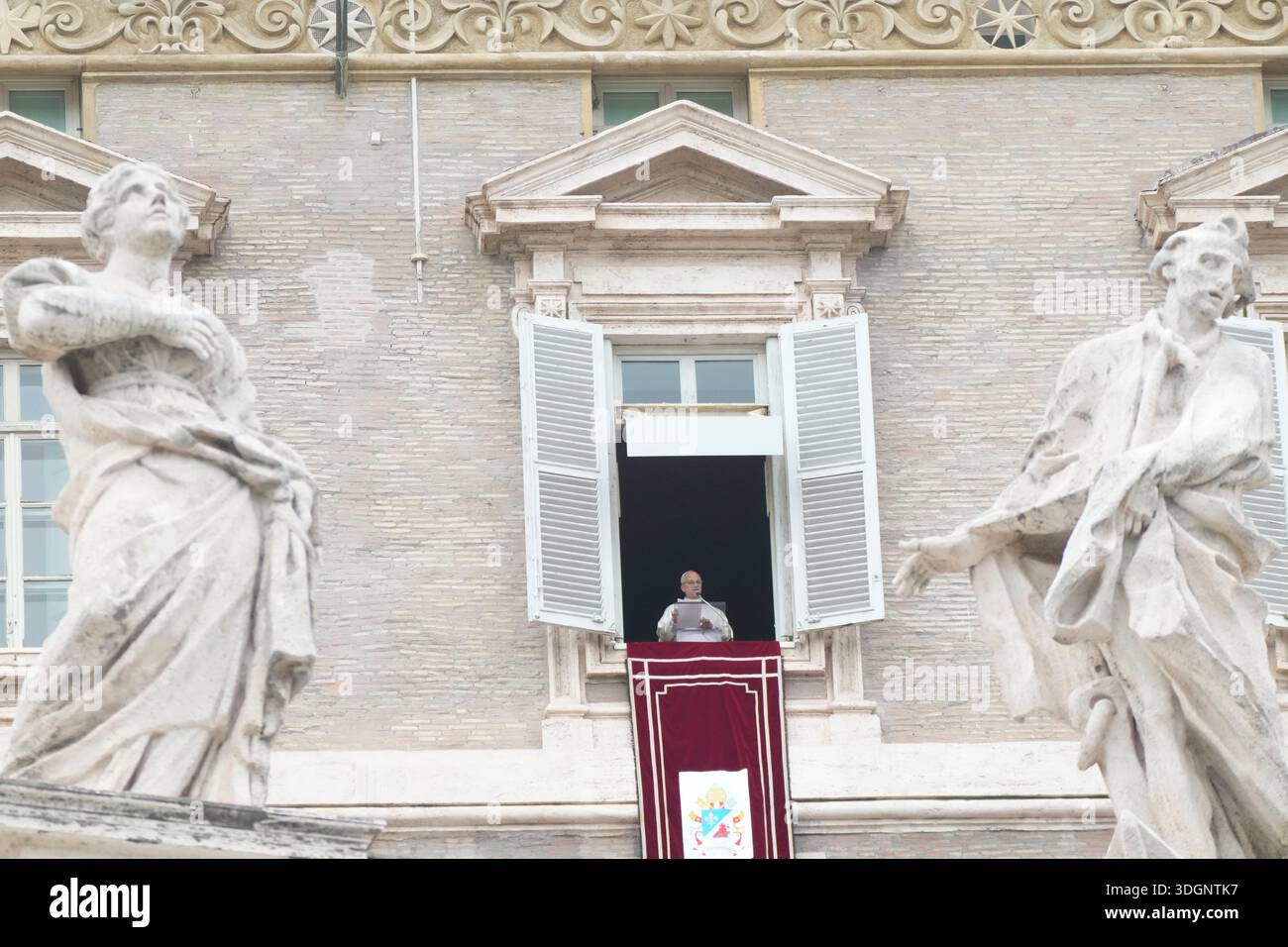 Pope Leo XIV delivers the Angelus noon prayer in St. Peter's Square at ...
