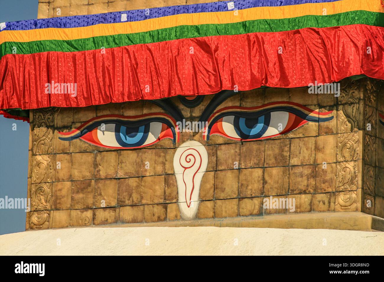The image displays the famous painted "Buddha eyes" on the square base ...
