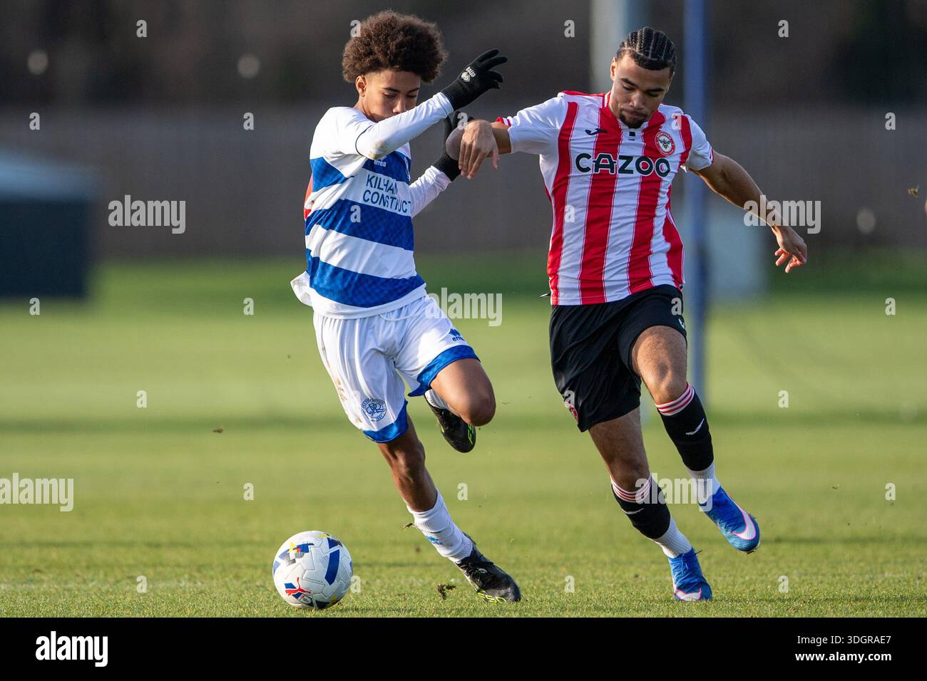 Leon Scarlett (QPR Dev) comes under pressure from Maxwell McKnight (#2 ...