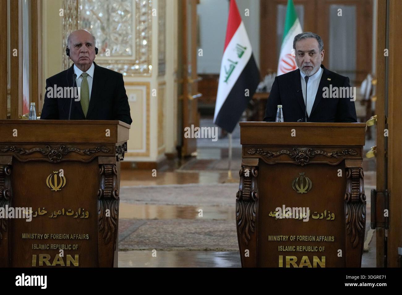 Iranian Foreign Minister Abbas Araghchi, right, speaks in a joint press ...