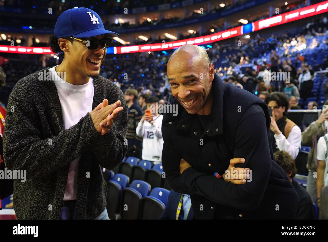 Virgil van Dijk (left) and Thierry Henry court side ahead of the NBA ...