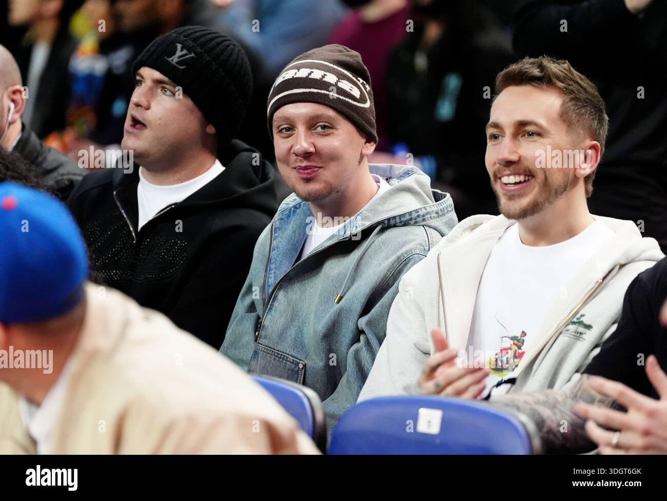 Aitch (centre) court side ahead of the NBA London Game 2026 at the O2 ...