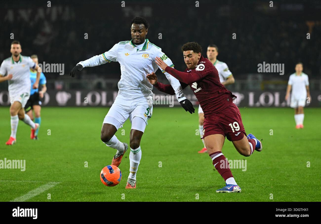 Evan Ndicka of AS Roma challenged by Che Adams of Torino FC during the ...