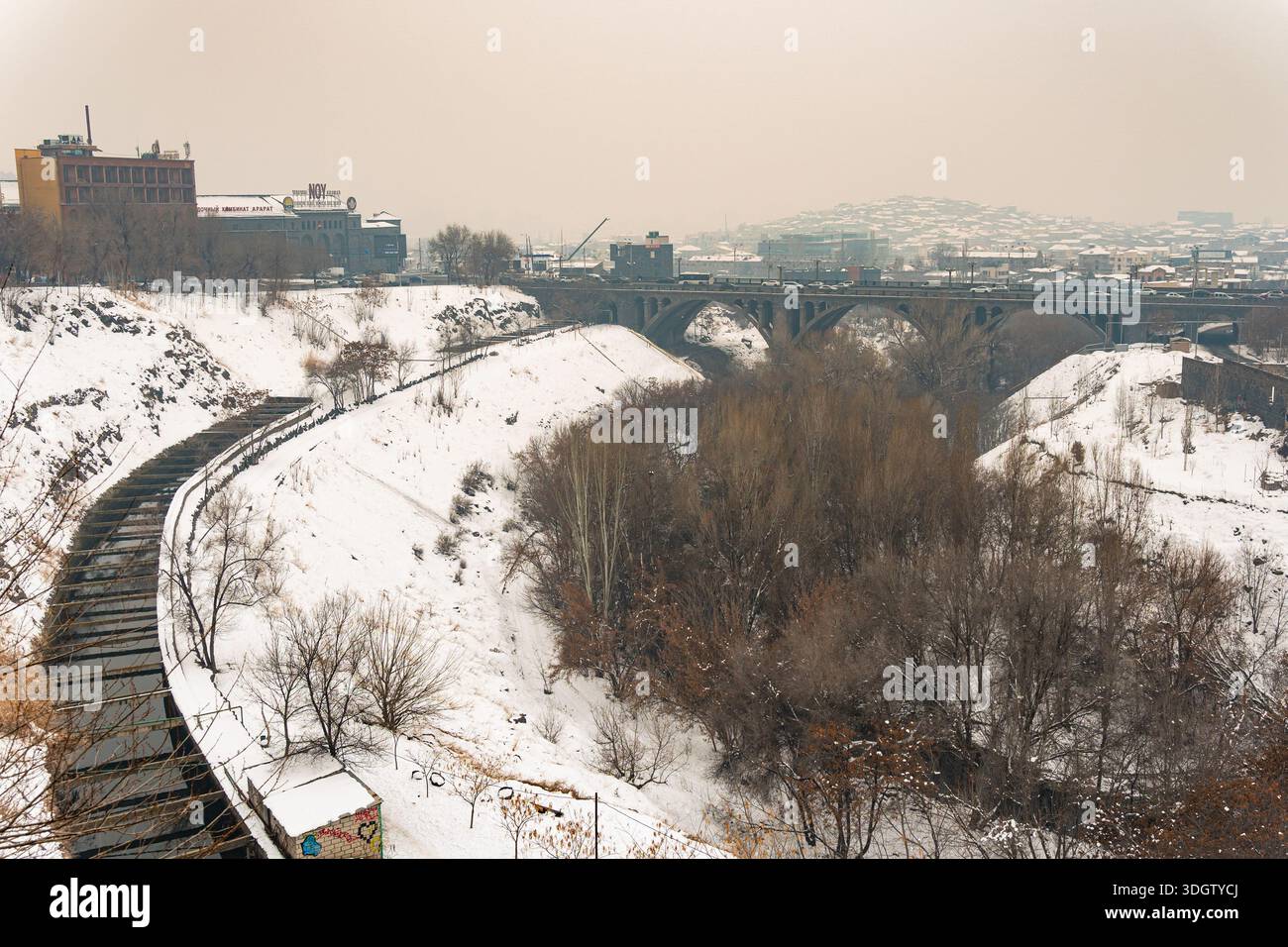 Yerevan, Armenia - January 9, 2026: Snowy urban gorge scene shows deep ...