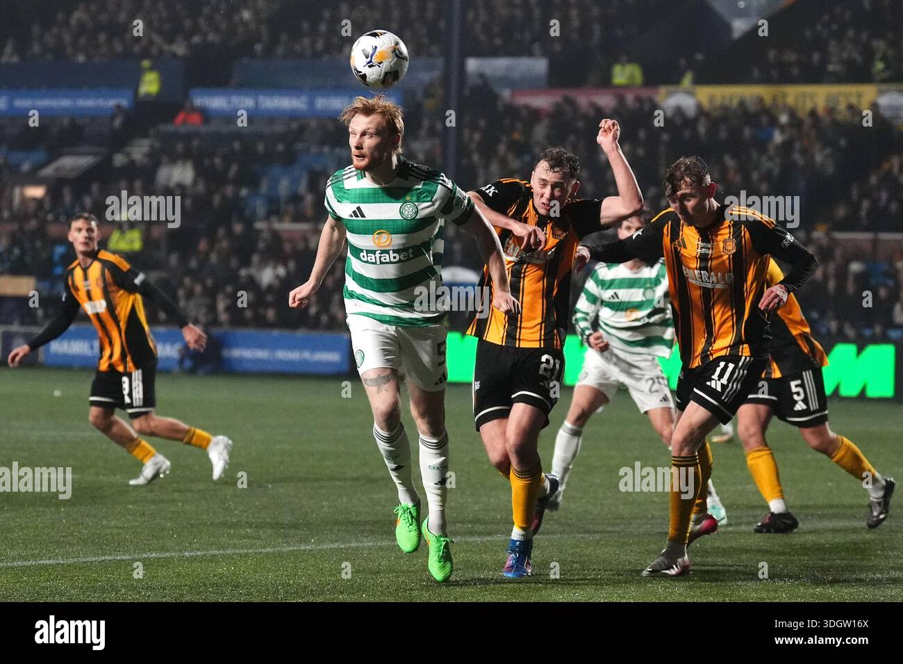 Celtic's Liam Scales (left) clears the ball during the Scottish Gas Men ...