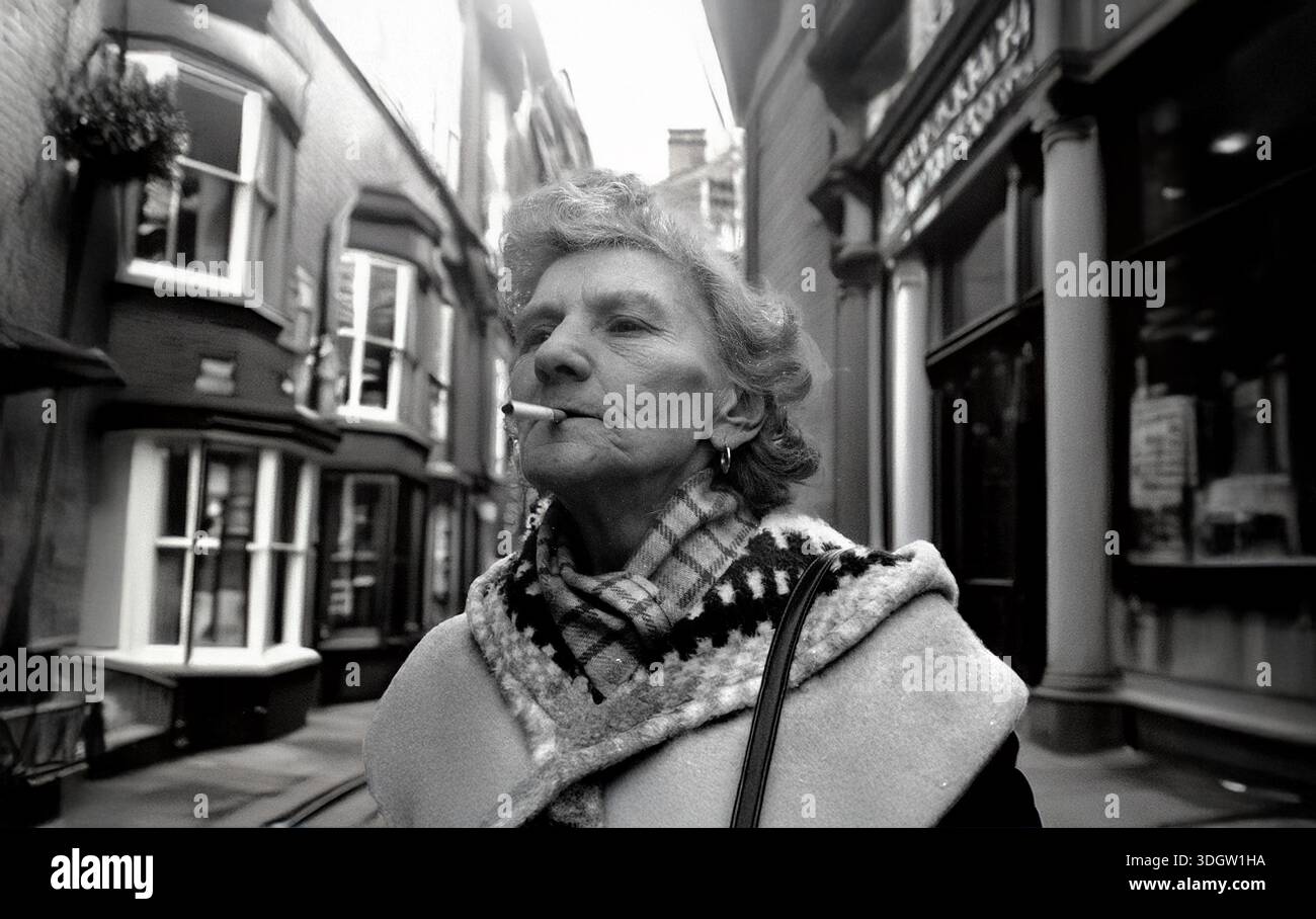 Woman with cigarette in her mouth in England, Britain, Uk 1985 Stock ...