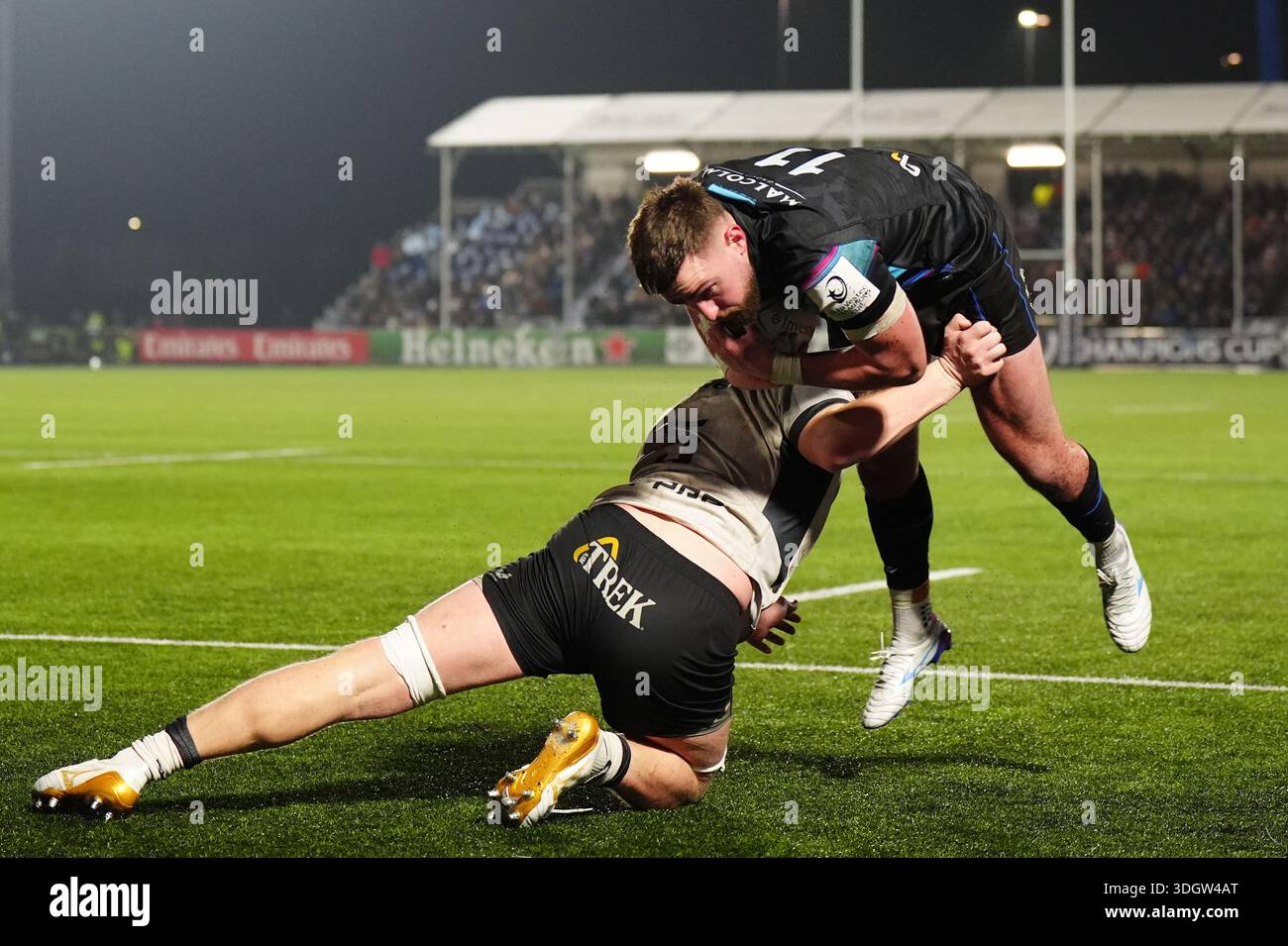 Glasgow Warriors' Ollie Smith (right) is tackled Saracens' Hugh Tizard ...
