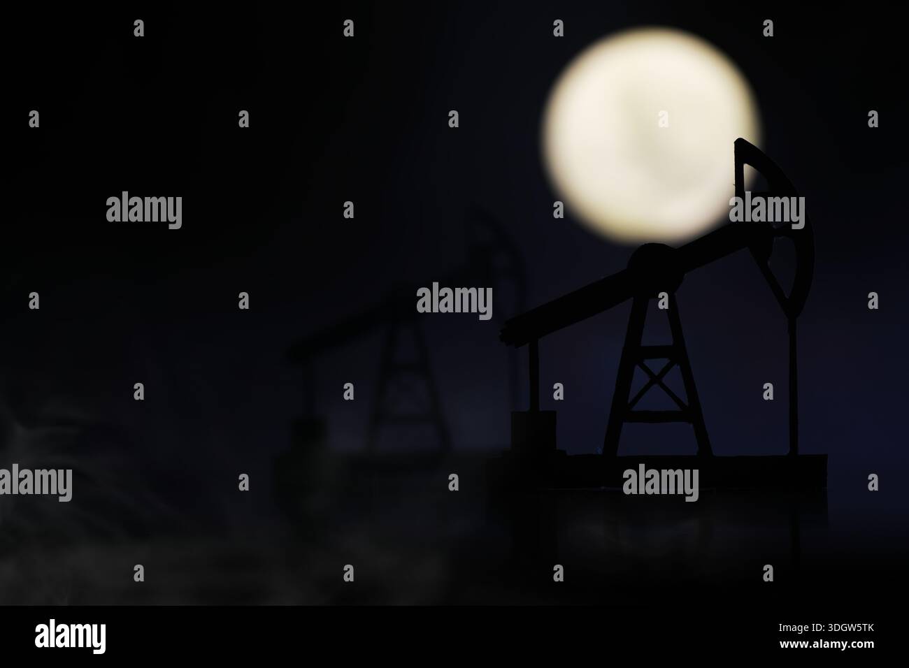 The crank balanced beam pumping unit night. Beam pumping unit under the ...