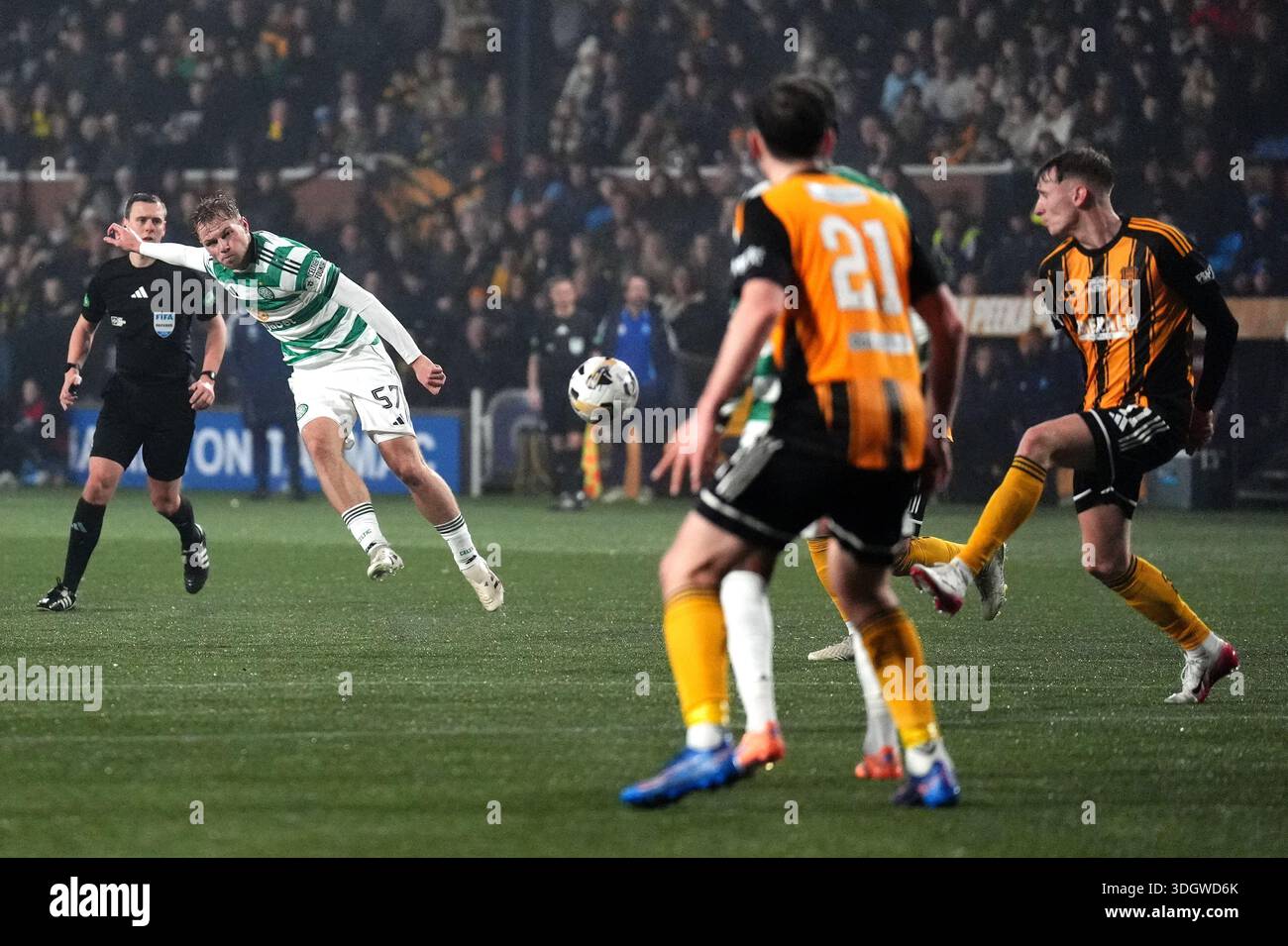 Celtic's Stephen Welsh (left) attempts a shot towards goal during the ...