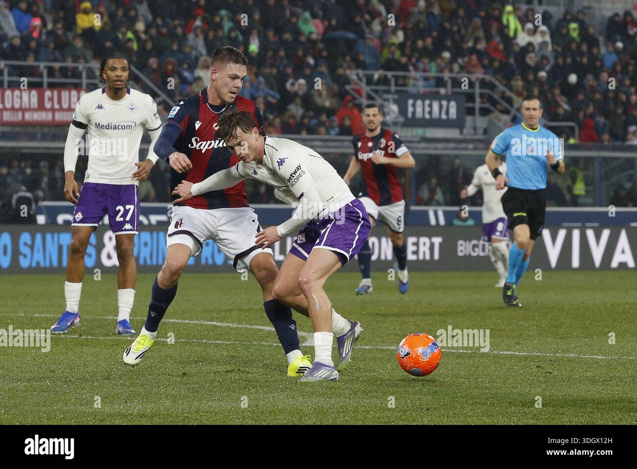 Albert Guomundsson of ACF Fiorentina battle for the ball with Emil Holm ...