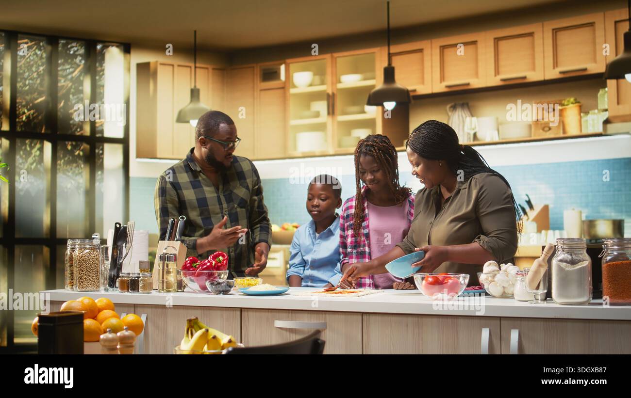 Parents teaching children delicious hi-res stock photography and images ...