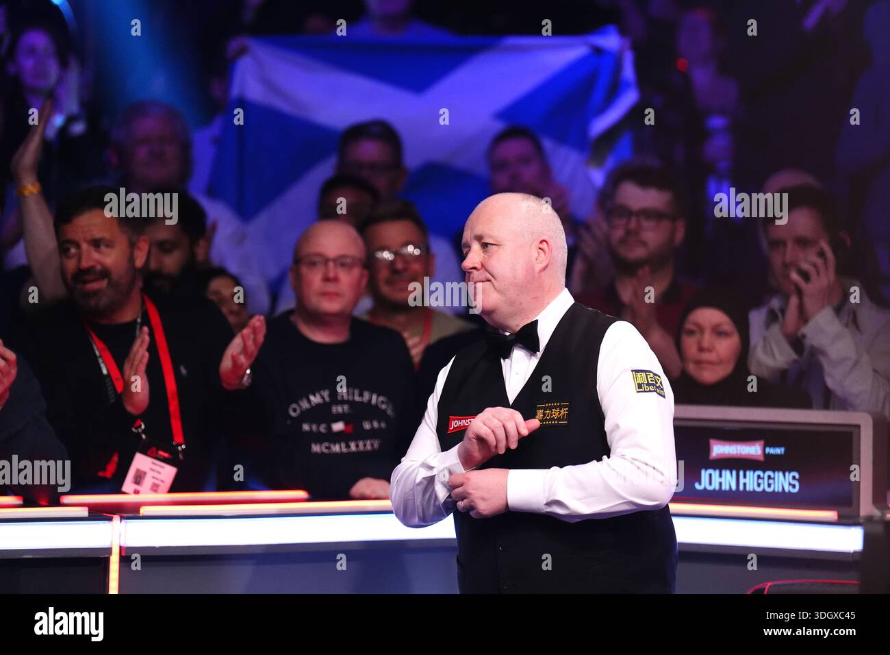 John Higgins, with a Scotland flag in the backgroun, following defeat ...