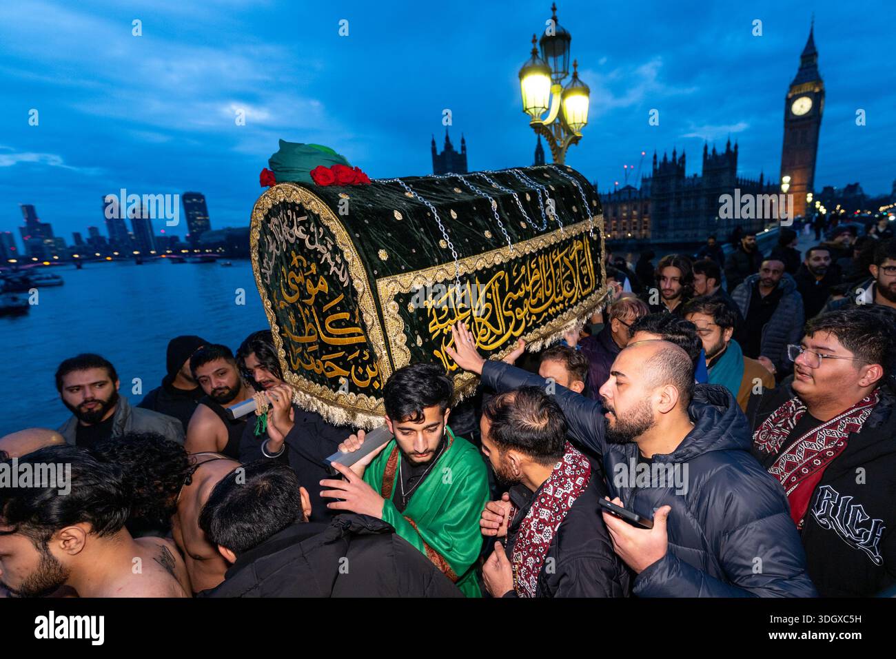 London, UK. 18th Jan, 2026. Worshippers seen carrying the coffin. Shia ...