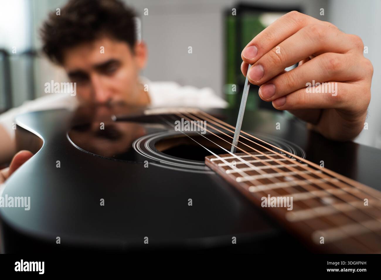 Fine-tuning an acoustic guitar truss rod with precision using an Allen ...