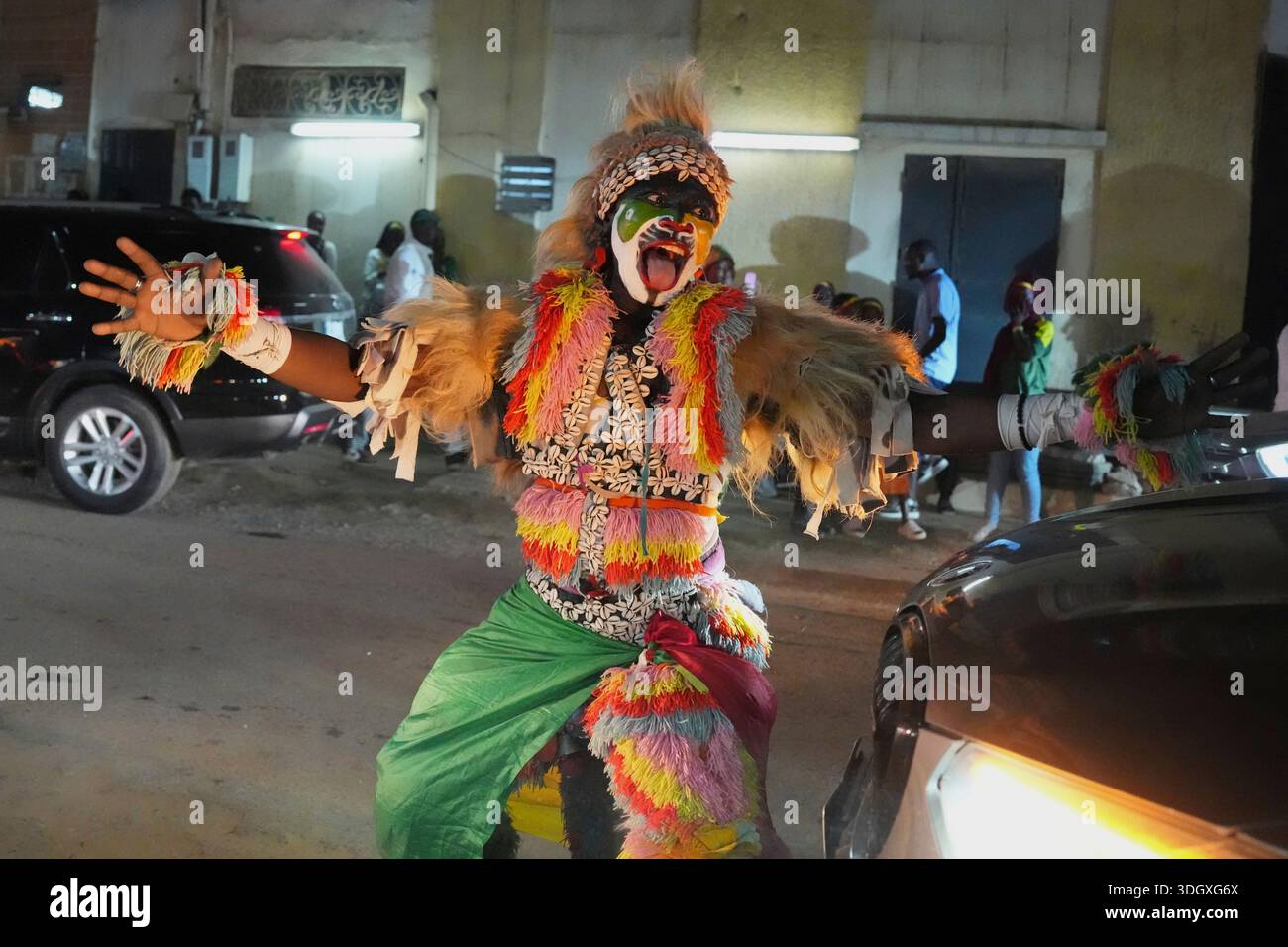 A fan celebrate Senegal's victory of the Africa Cup of Nations final ...