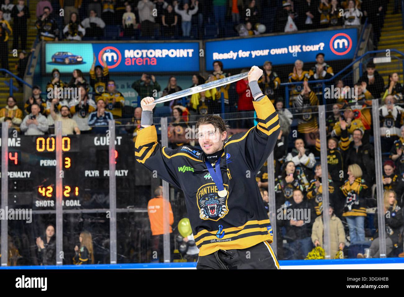 Joshua Tetlow of Nottingham Panthers holds aloft the Continental Cup ...