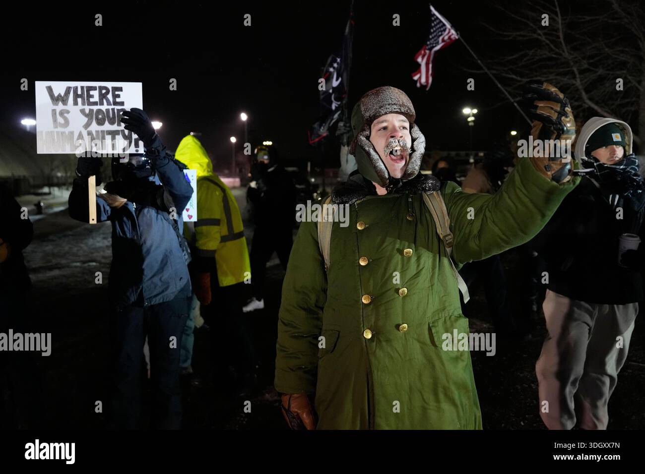 Protesters shout at vehicles leaving the Bishop Henry Whipple Federal ...