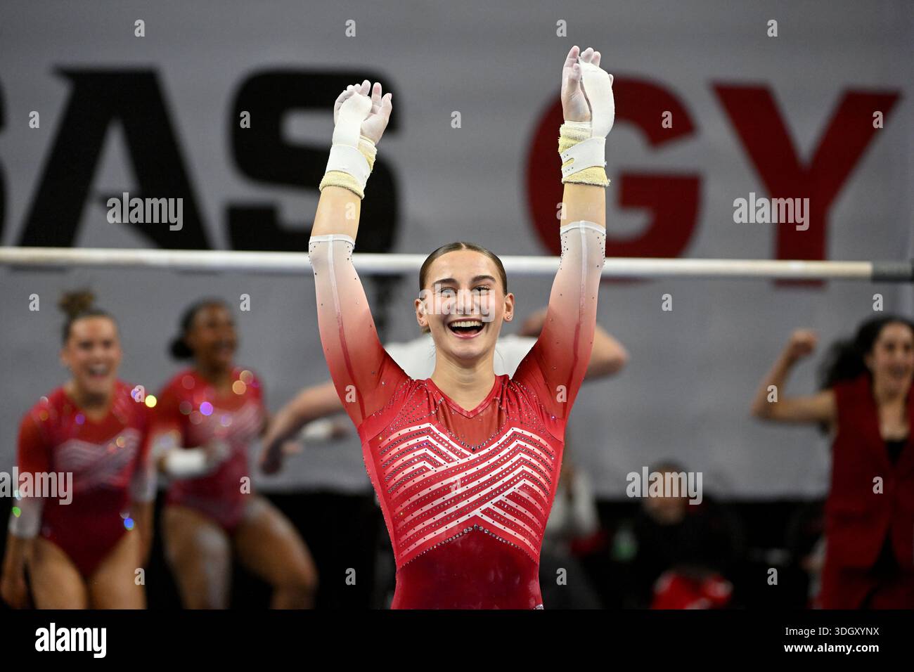 Arkansas gymnast Allison Cucci competes on the bars during an NCAA ...