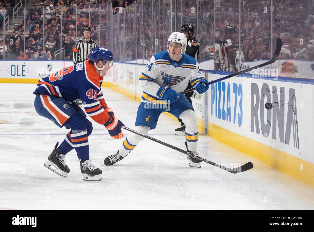St. Louis Blues' Dalibor Dvorsky (54) and Edmonton Oilers' Ty Emberson ...