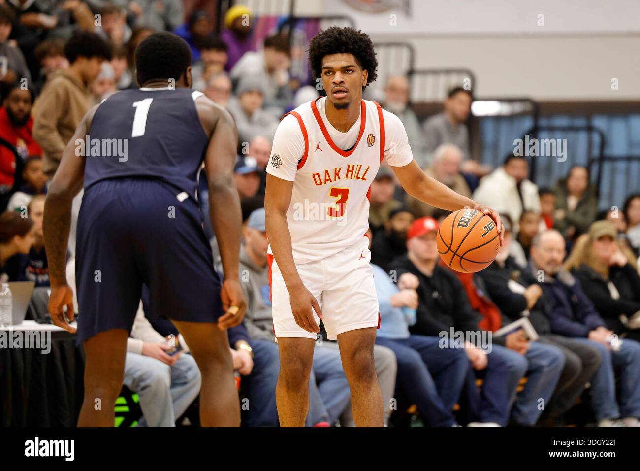 Oak Hill Ethan Mgbako (3) in action against Brewster during a high ...