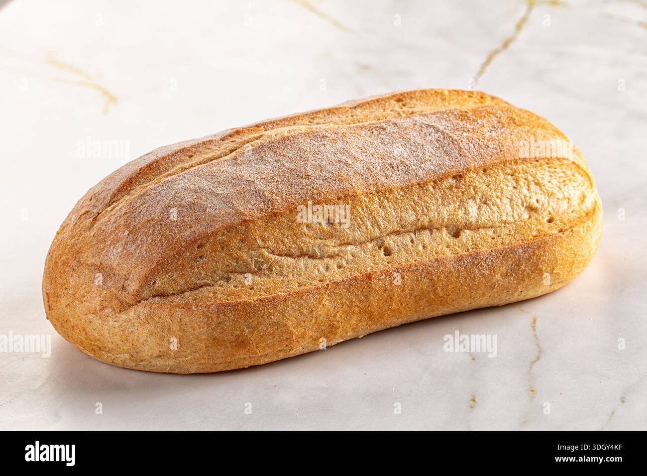 Rustic crusty brown loaf bread for breakfast Stock Photo - Alamy
