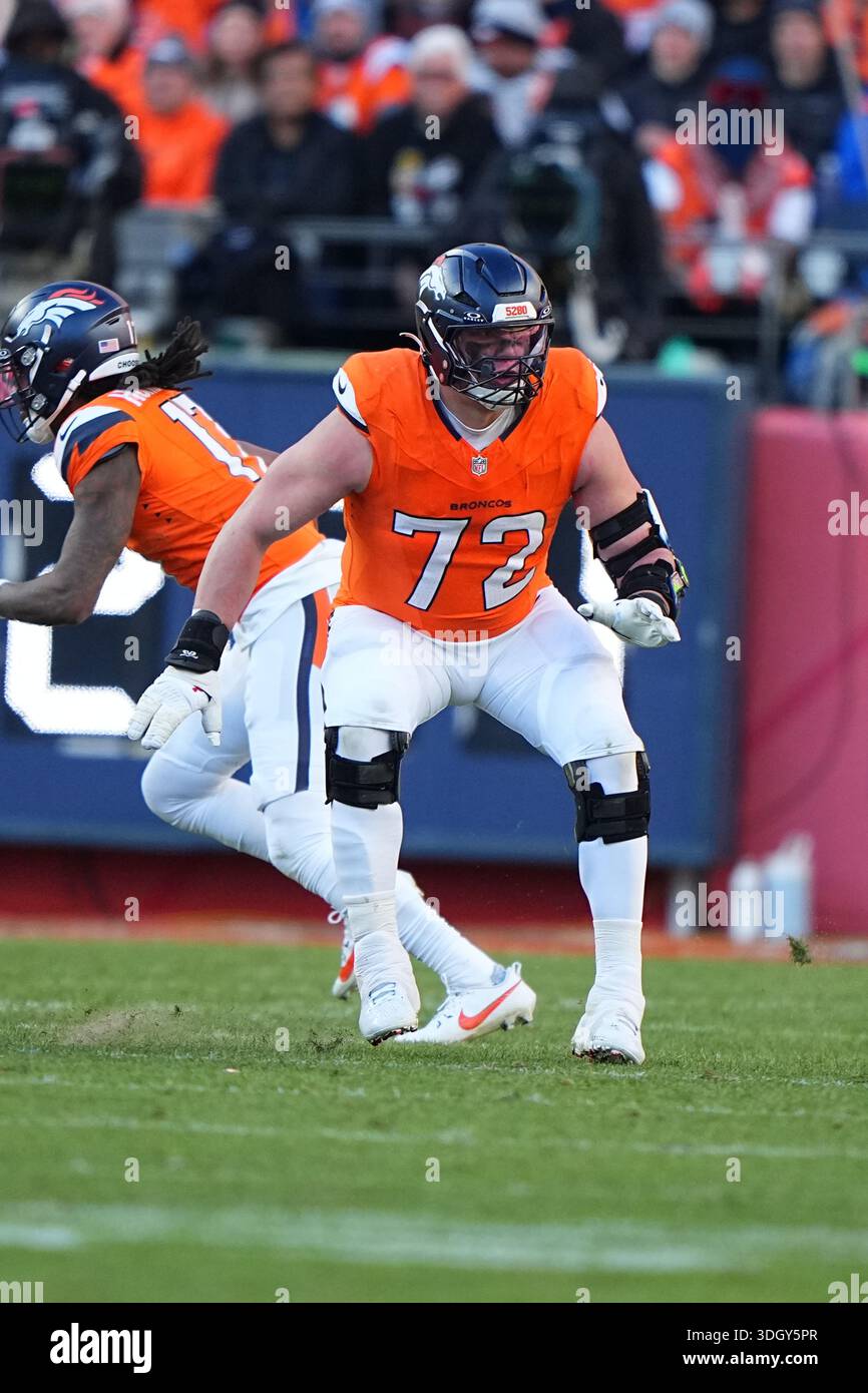 Denver Broncos offensive tackle Frank Crum (73) makes a block against ...