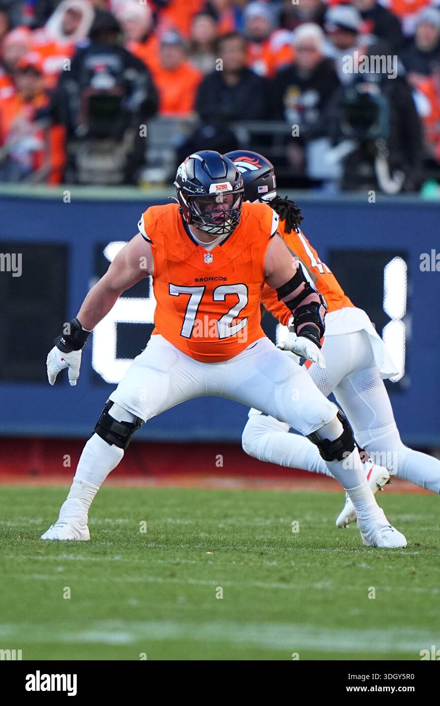 Denver Broncos offensive tackle Frank Crum (73) makes a block against ...