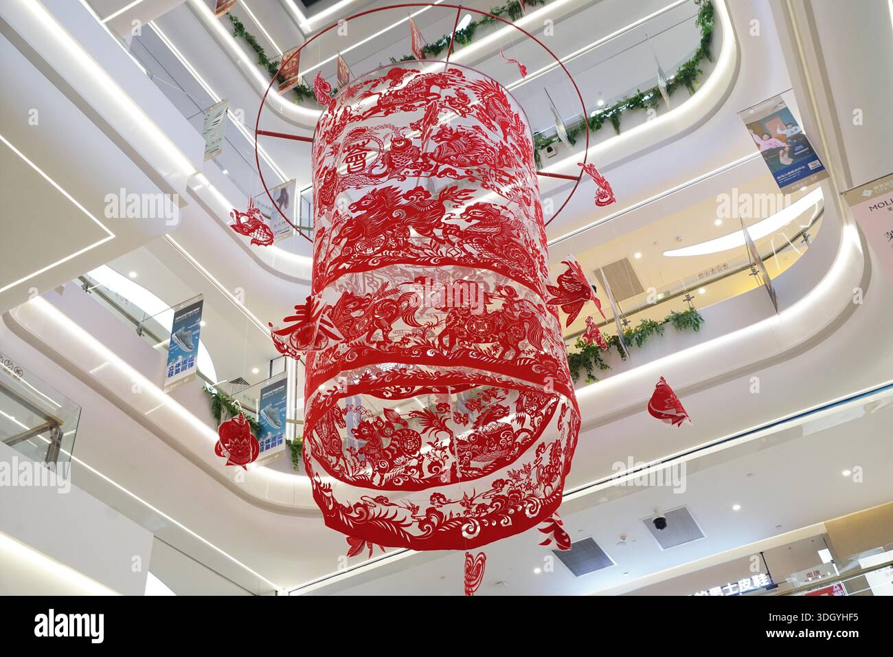 A giant paper-cut horse installation hangs in a mall in Xi'an City ...