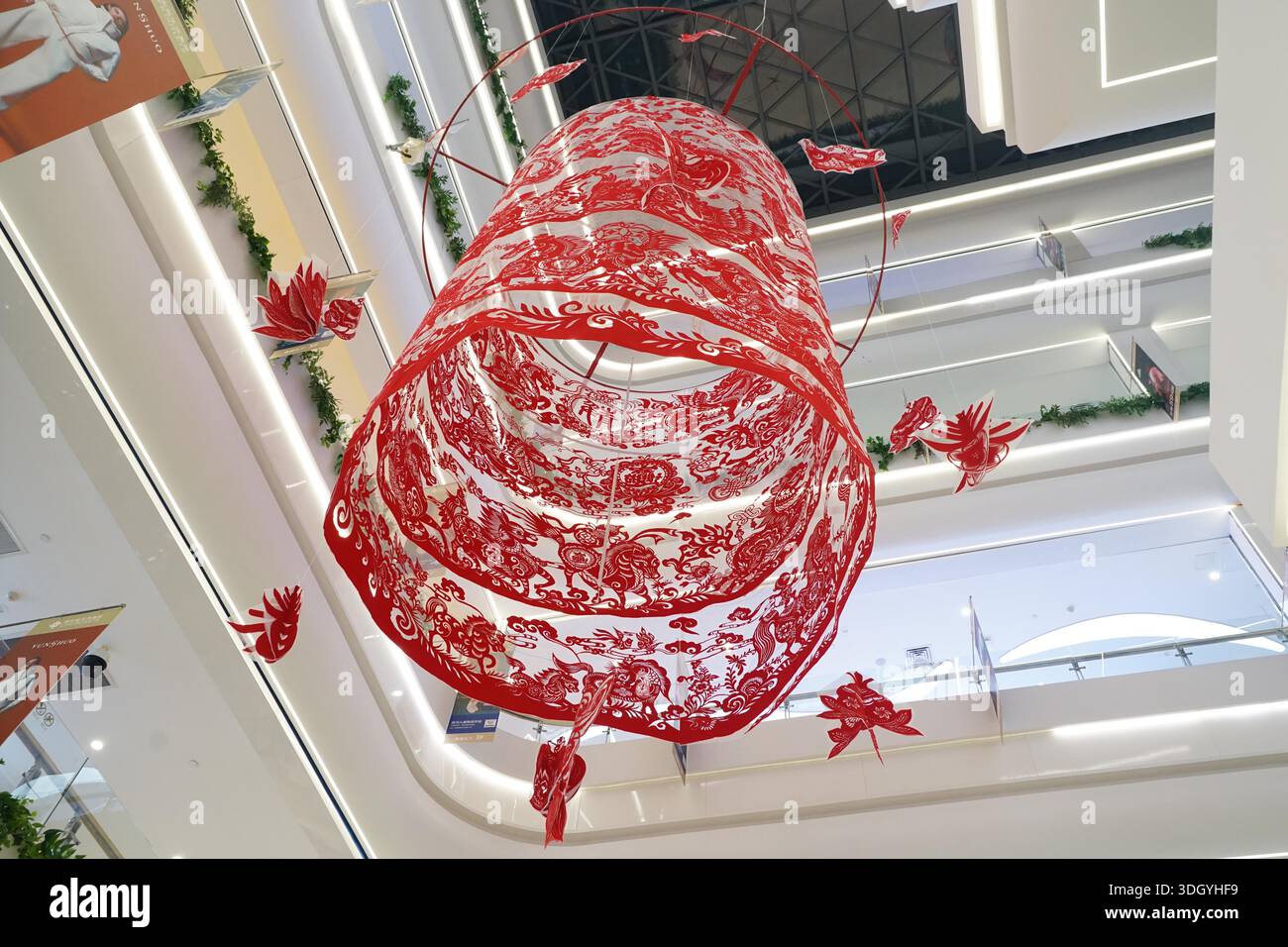 A giant paper-cut horse installation hangs in a mall in Xi'an City ...