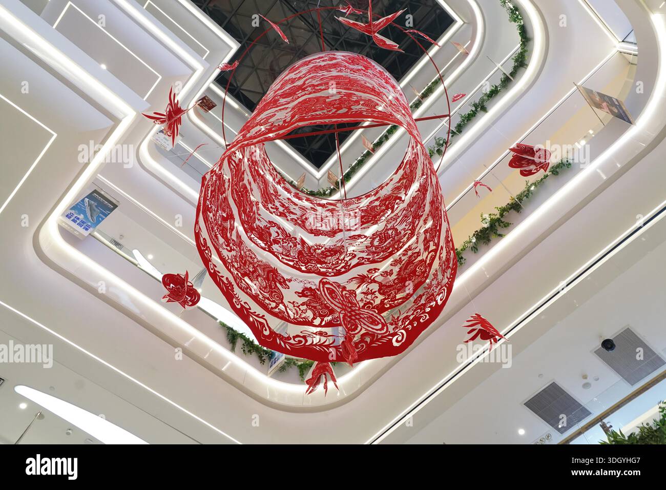 A giant paper-cut horse installation hangs in a mall in Xi'an City ...