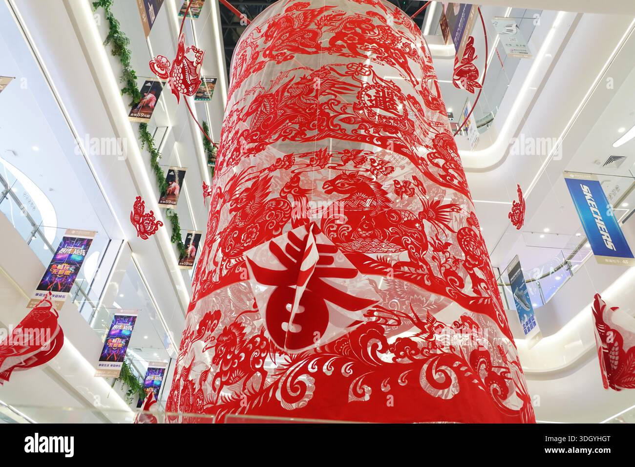 A giant paper-cut horse installation hangs in a mall in Xi'an City ...