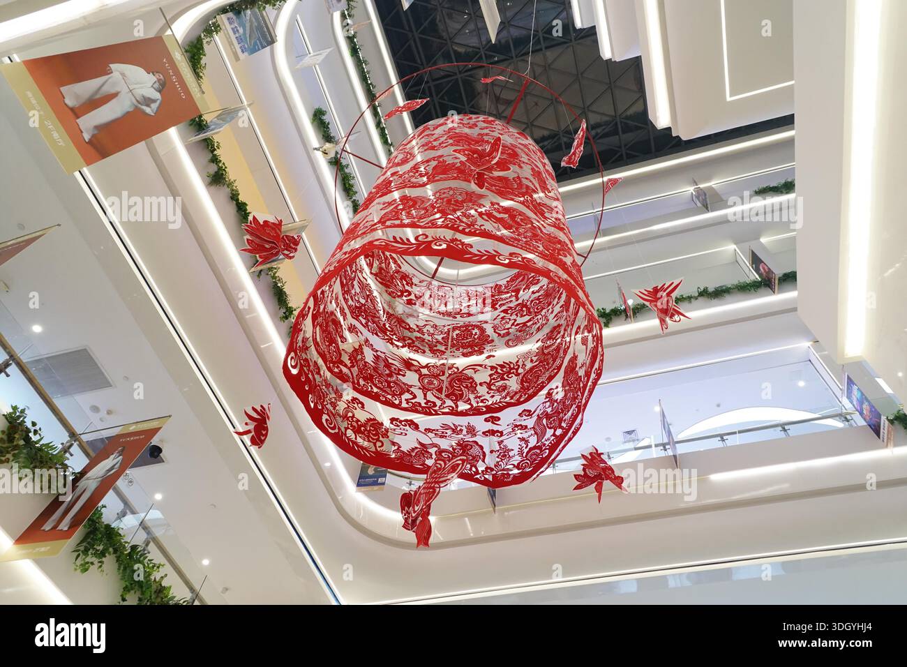 A giant paper-cut horse installation hangs in a mall in Xi'an City ...