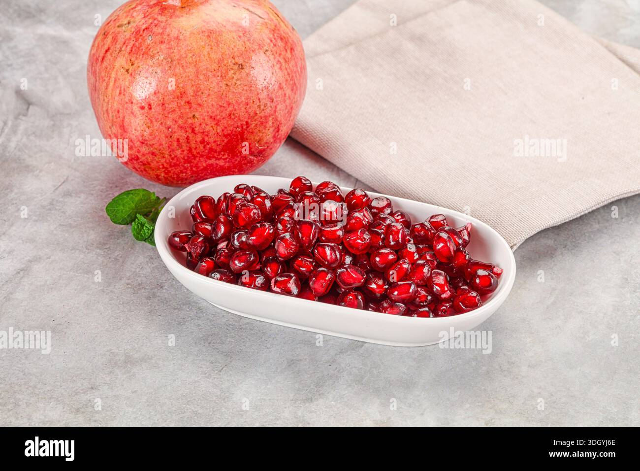 Ripe sweet red pomegranate seeds in the bowl Stock Photo - Alamy