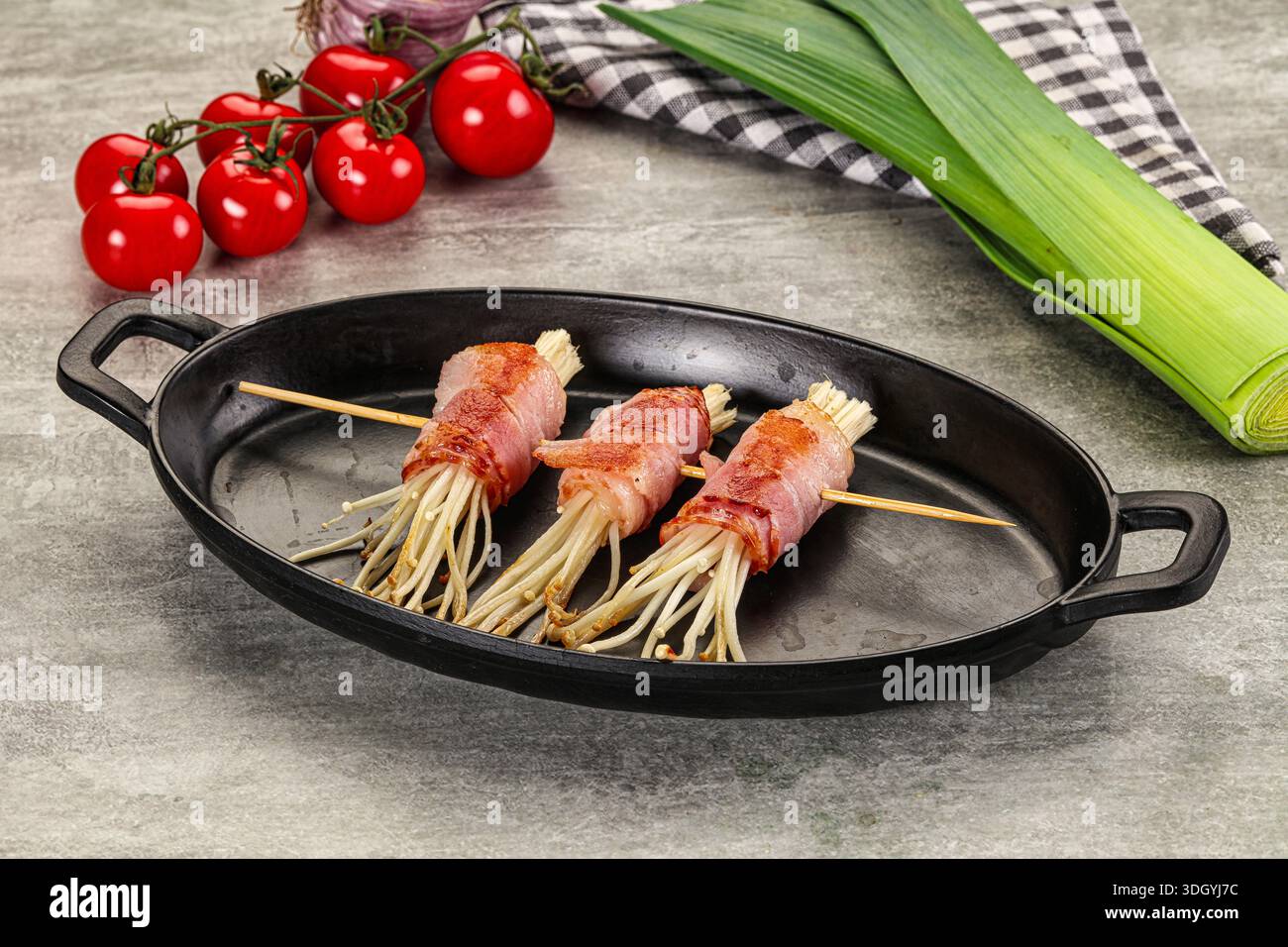 Grilled enoki mushroom with bacon roll wrap Stock Photo - Alamy