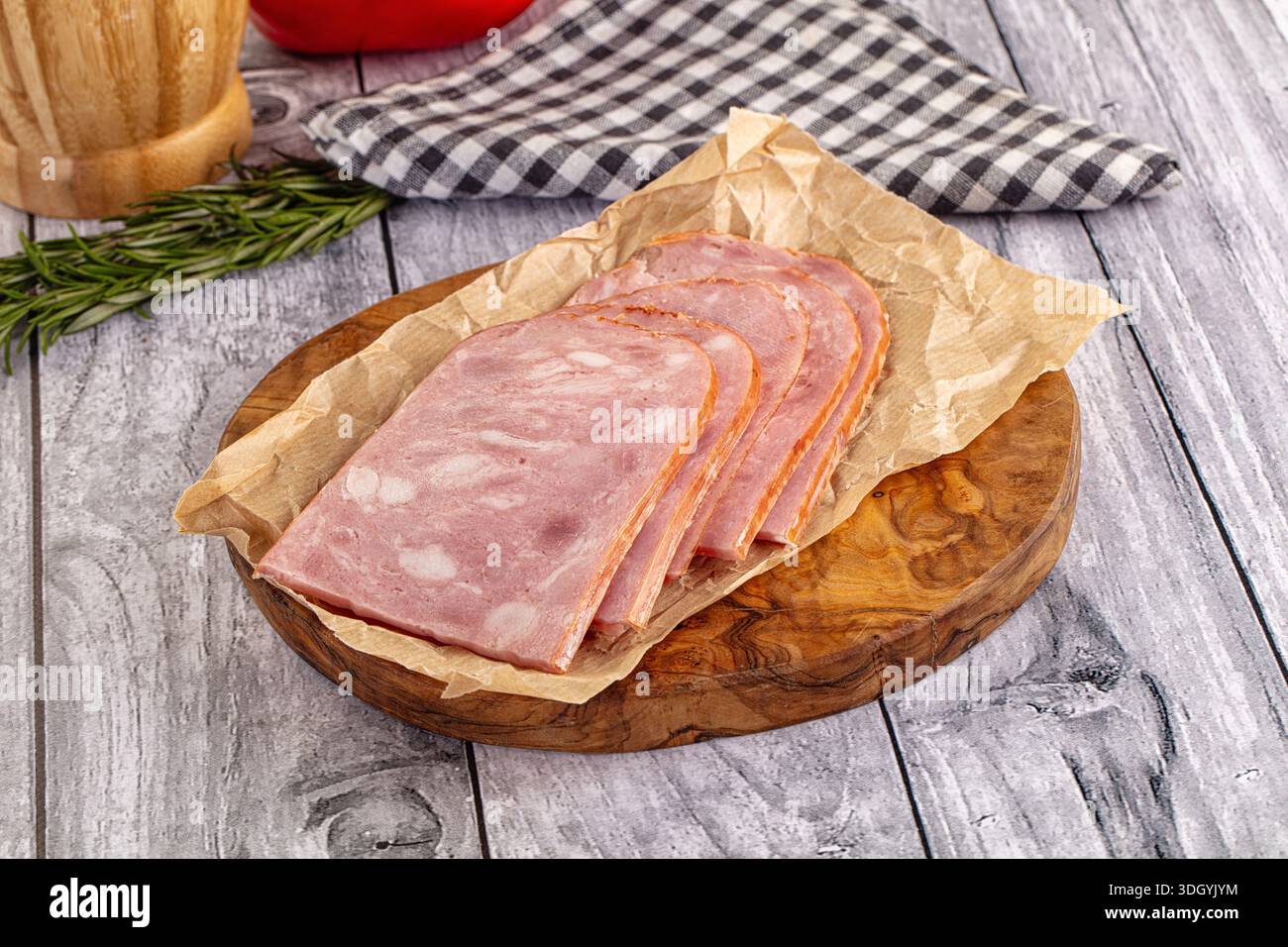 Sliced porjk ham over boatd for breakfast Stock Photo - Alamy