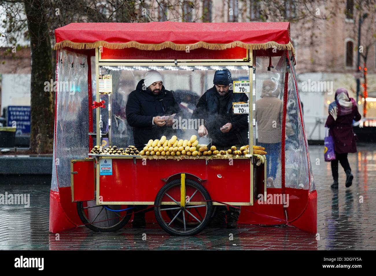Istanbul, Turkey. 18th Jan, 2026. A street vendor stands on Eminonu ...