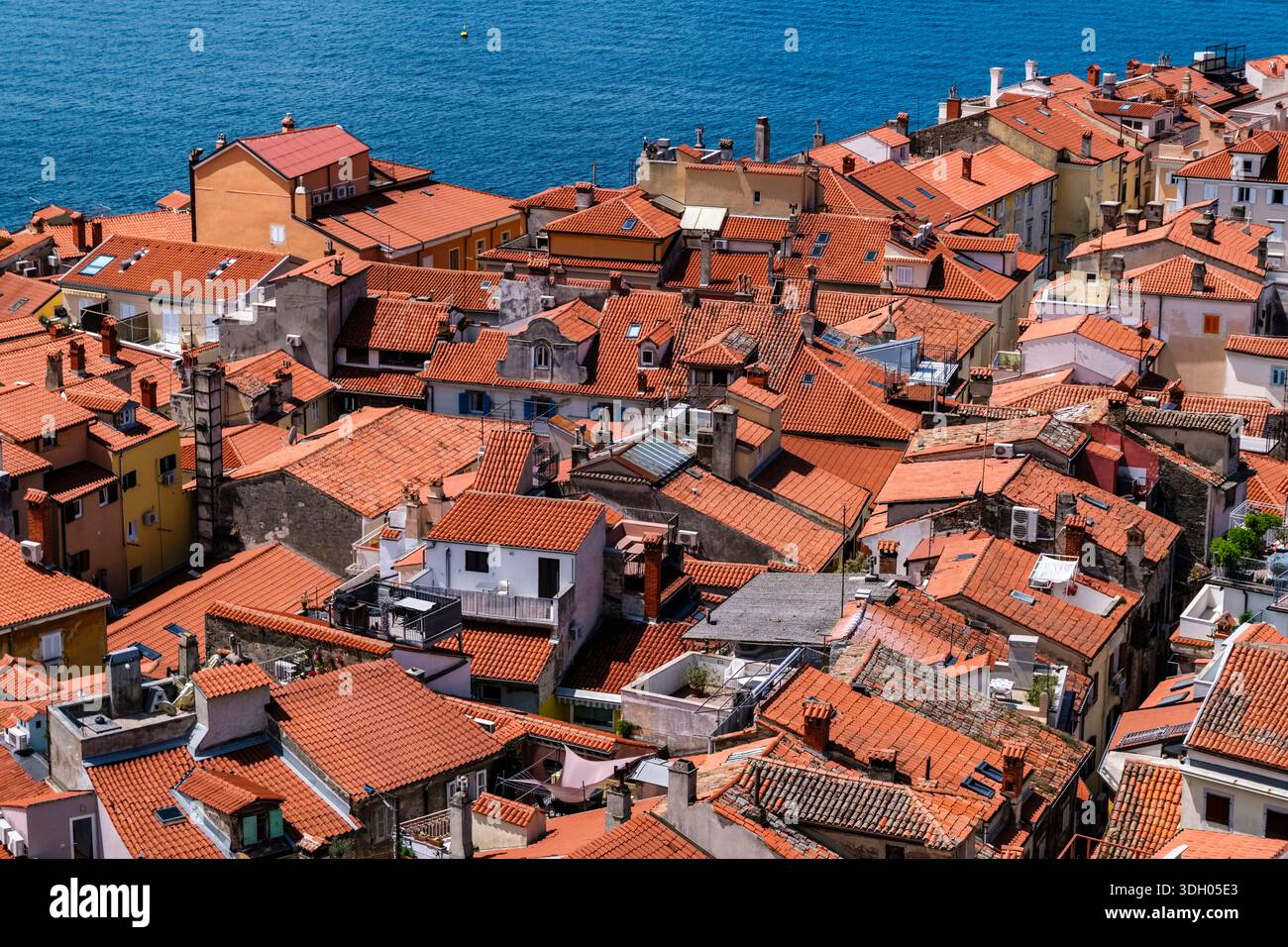 Densely packed traditional houses orange hi-res stock photography and ...