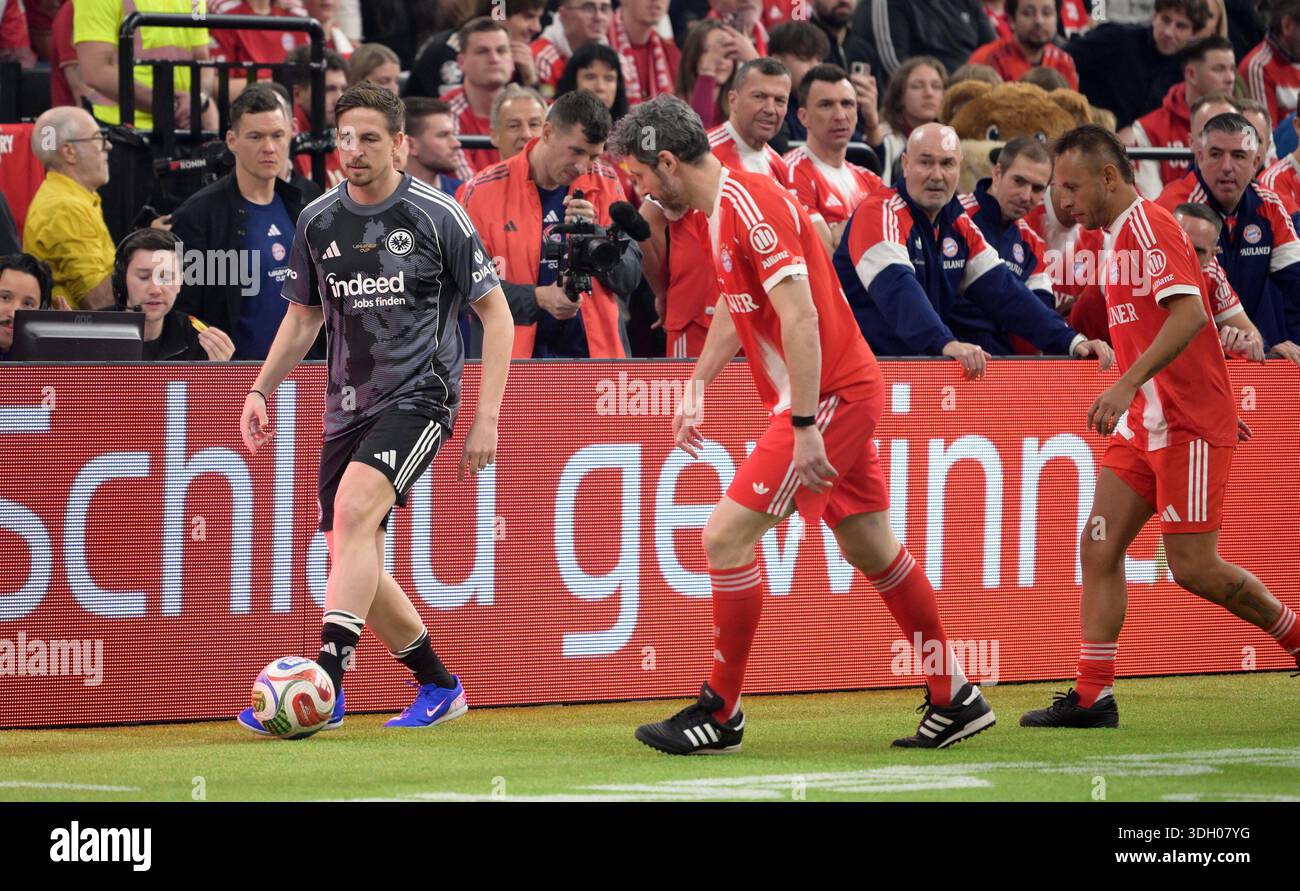 from left: Bastian Oczipka, Mark van Bommel, Rafinha (Bayern) Munich ...