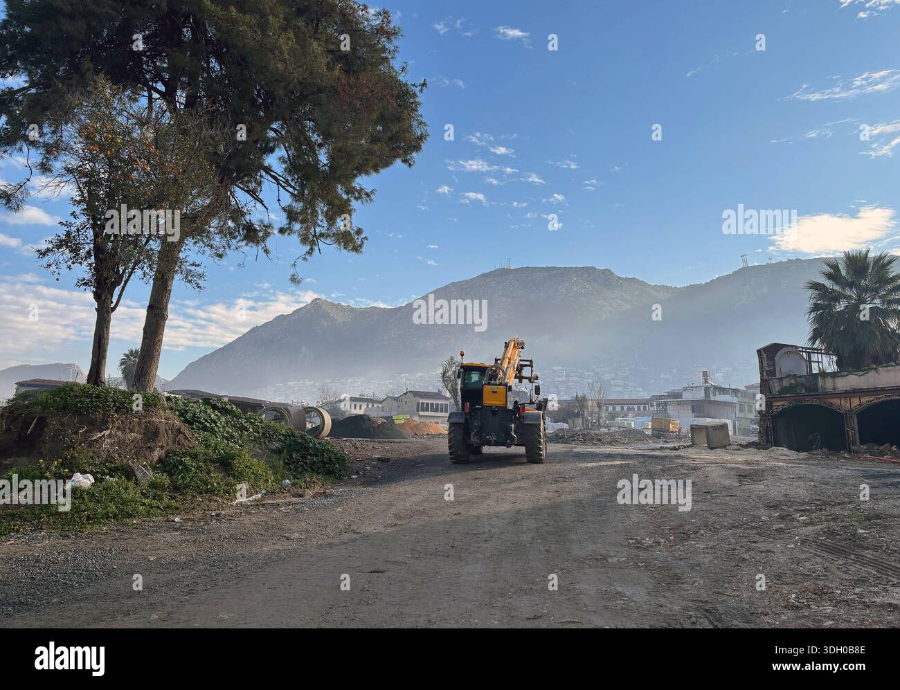 14 January 2026, Turkey, Antakya: View of a construction vehicle in ...
