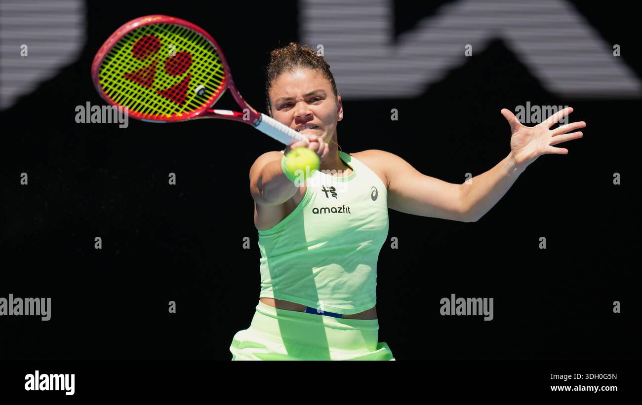 Jasmine Paolini of Italy returns a shot to Aliaksandra Sasnovich of ...