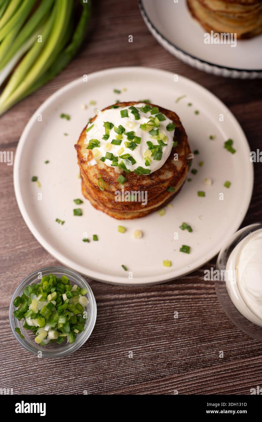 Stack golden potato fritters hi-res stock photography and images - Alamy