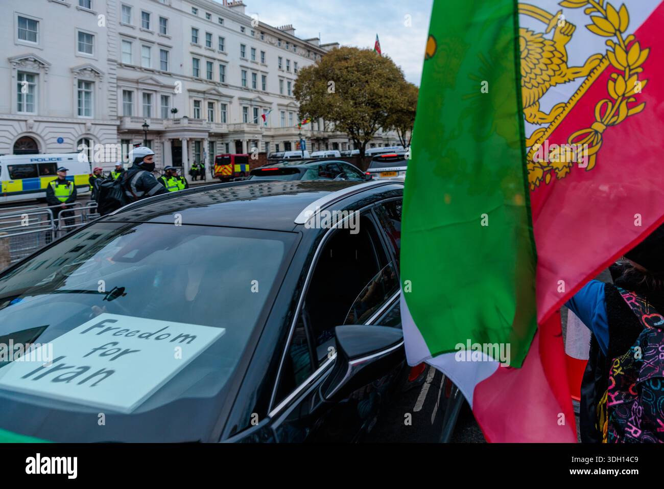 Iranian Embassy, London, UK. 18th January 2026. A convoy of cars, many ...