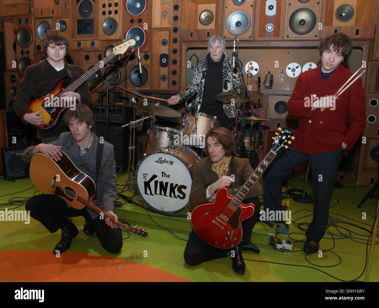 London, UK. Original The Kinks drummer Mick Avory (centre) at the ...