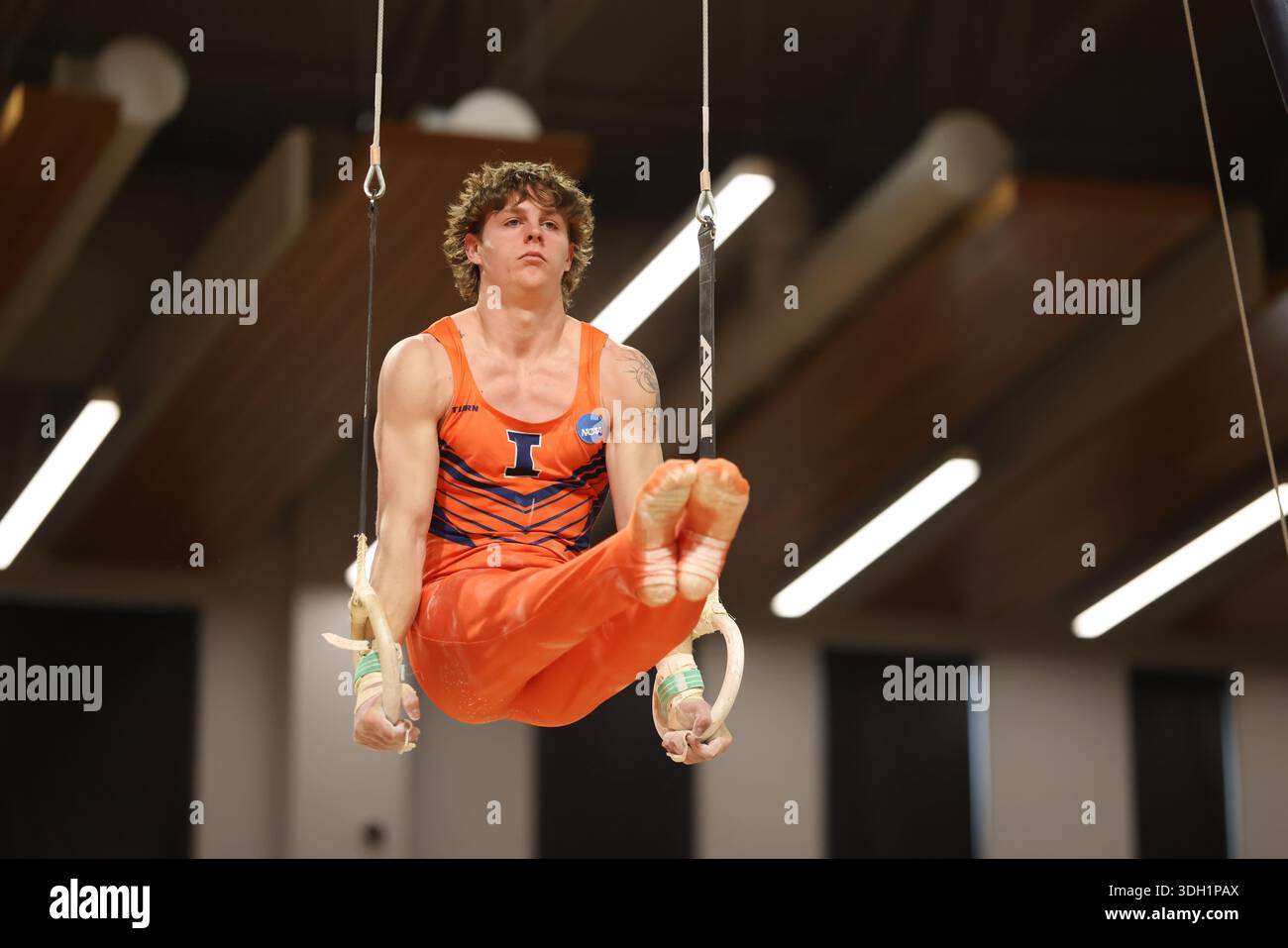 Illinois gymnast Garrett Schooley competes during an NCAA gymnastics ...
