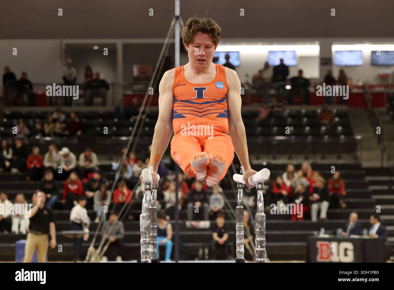 Illinois gymnast Connor Micklos competes during an NCAA gymnastics meet ...
