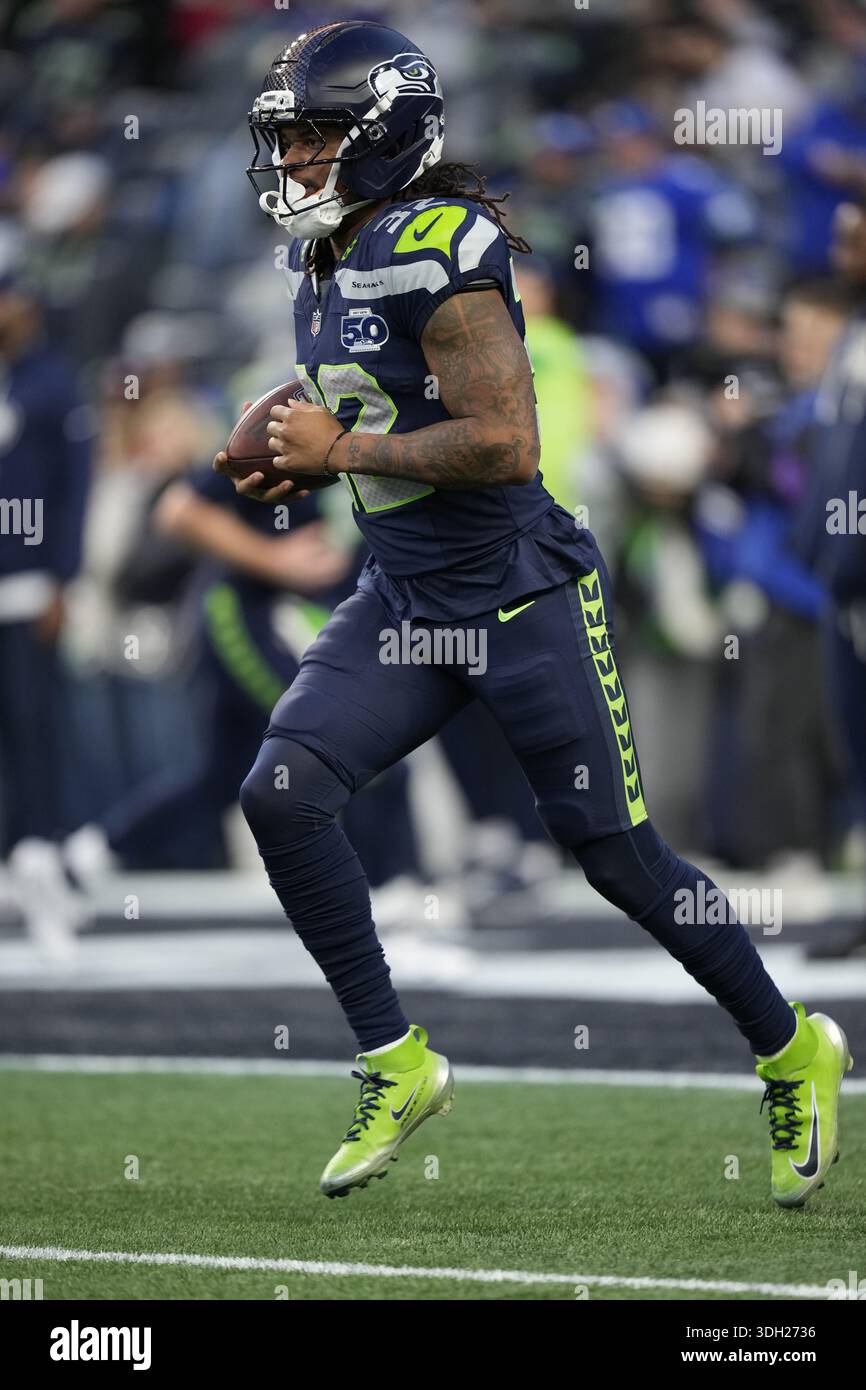 Seattle Seahawks running back Velus Jones Jr. (32) runs with the ball ...