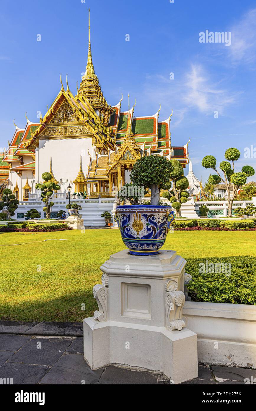 The Grand Royal Palace, pillar with bonsai flower pot, in the back the ...