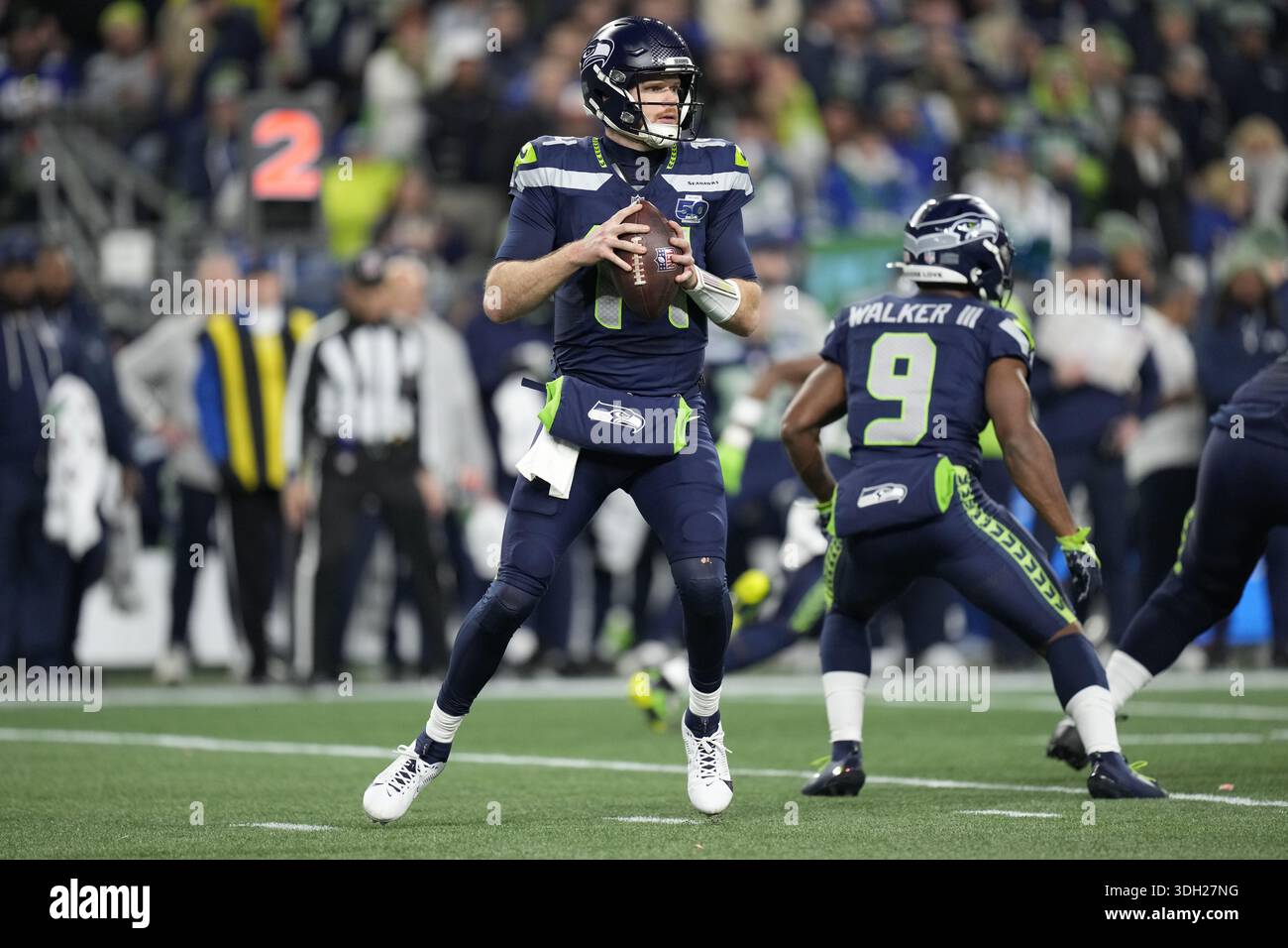 Seattle Seahawks quarterback Sam Darnold (14) looks to pass the ball in ...
