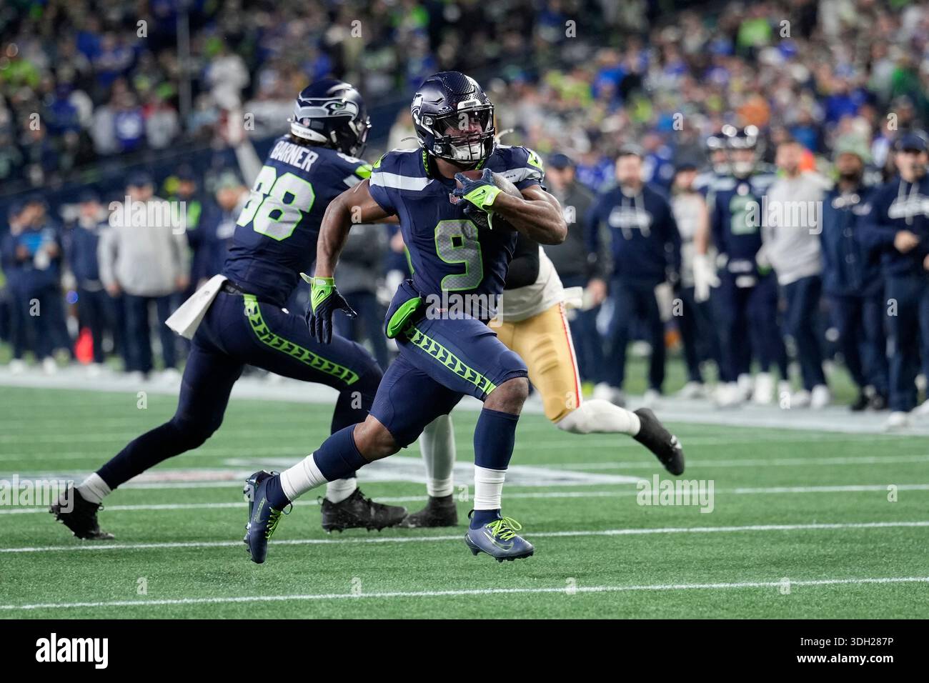 Seattle Seahawks running back Kenneth Walker III (9) runs with the ball ...