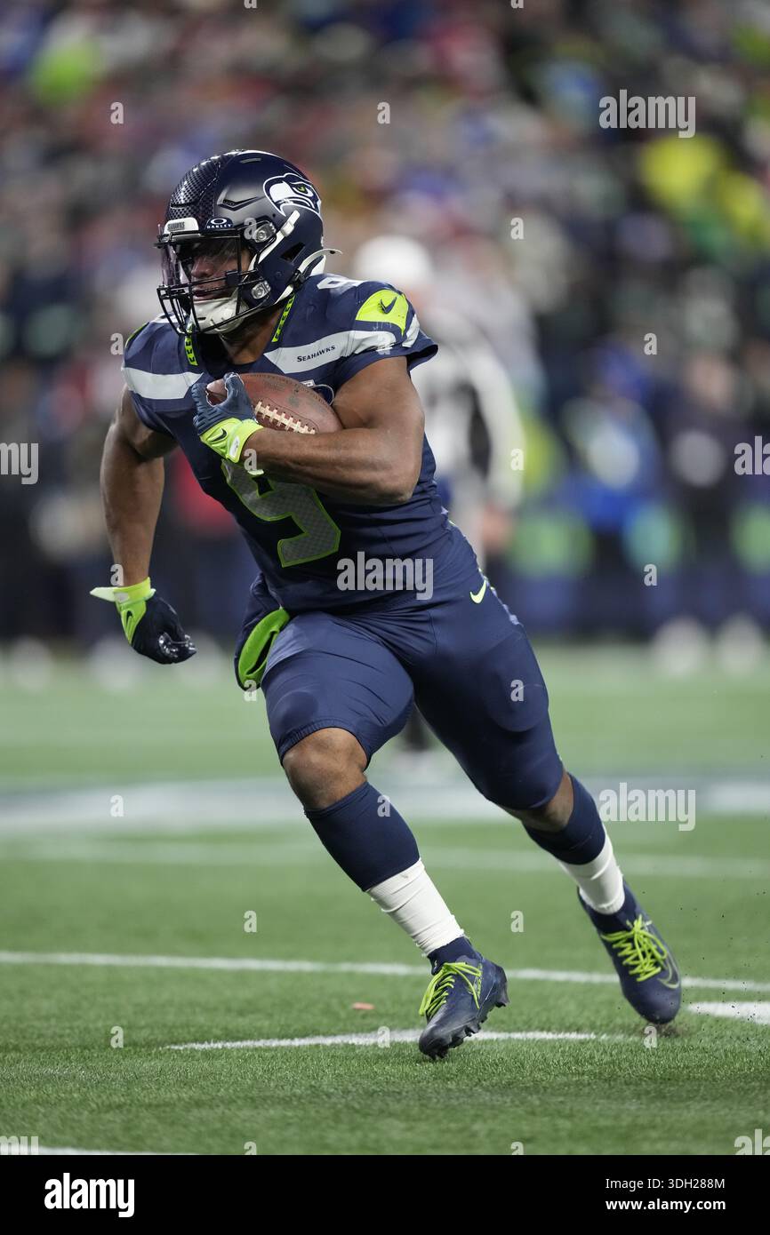 Seattle Seahawks running back Kenneth Walker III (9) runs with the ball ...
